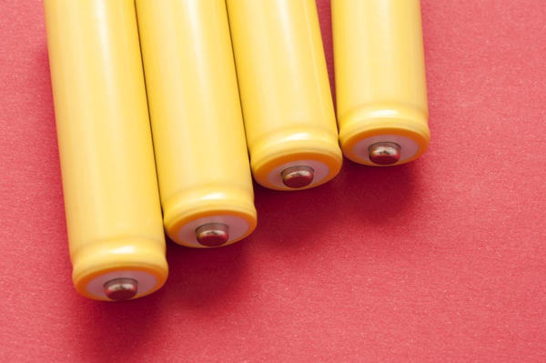 Set of four yellow batteries-8668 | Stockarch Free Stock Photo Archive